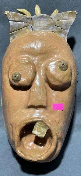 Handcrafted Face Mask Sculpture - Metzger Property Services, LLC