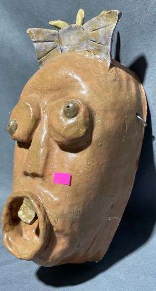 Handcrafted Face Mask Sculpture - Metzger Property Services, LLC