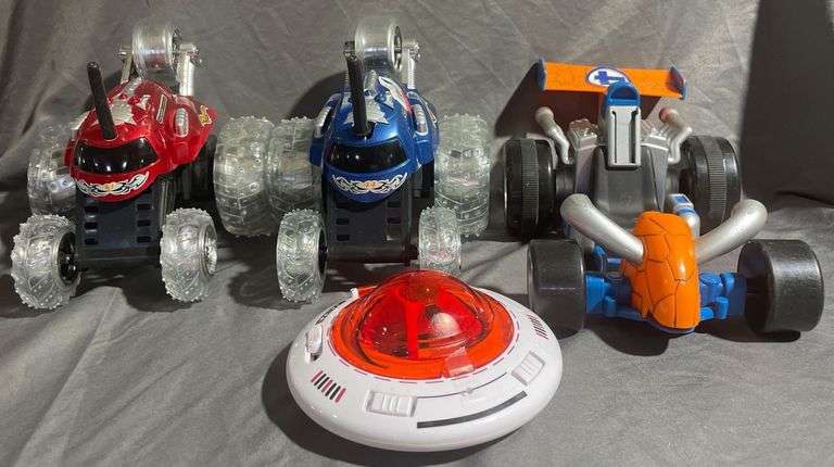 Remote-Controlled Cars and Plastic UFO Toy - Metzger Property Services, LLC
