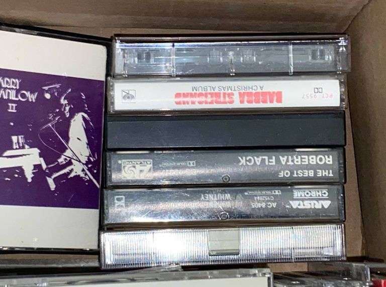 Music CDs and Cassette Tapes Featuring Various Genres and Artists ...