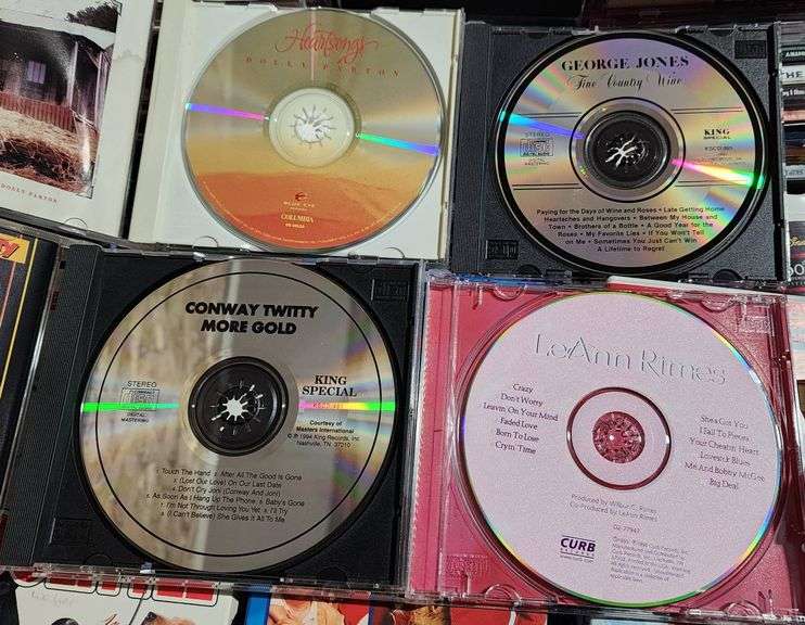 VHS Tapes and CDs Featuring Movies and Music Including Bambi, The Lion ...