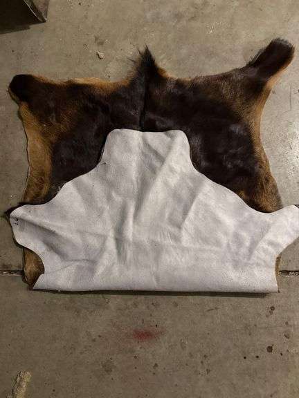 Two Animal Hides in Brown and Tan Tones, 34” x 36” - Metzger Property ...