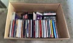 Music CDs and Cassette Tapes Featuring Various Genres and Artists ...