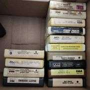 Rotating Rack for 8-Track Tapes with Assorted Media Storage - Metzger Property Services, LLC