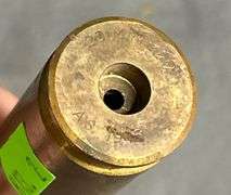 2 Brass Artillery Shell Casings with One Projectile, Marked Souvenir of ...