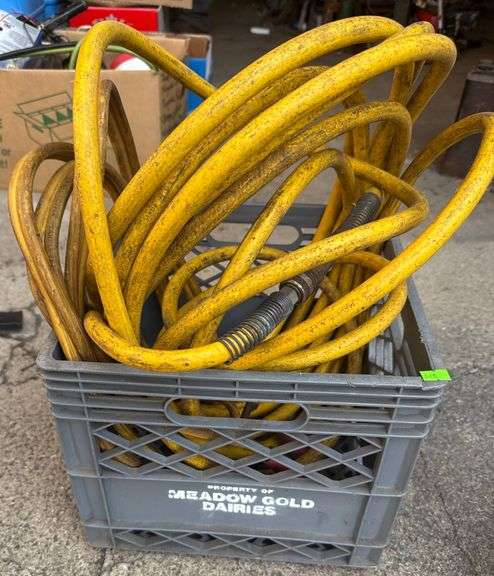 Yellow Rubber Hoses with Metal Fittings in Meadow Gold Dairies Milk ...