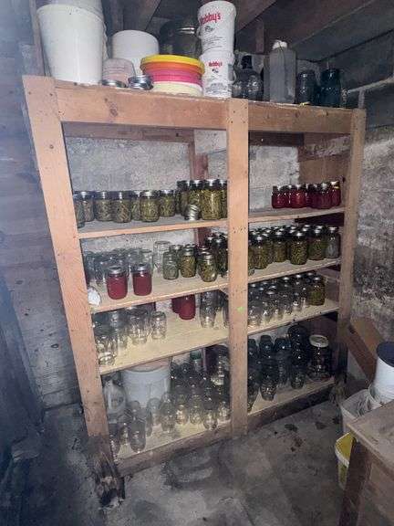 Shelving Unit Containing Canned Food, Tomato Sauce, and Empty Canning ...