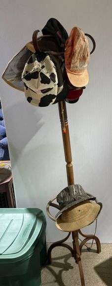 Free Standing Hat Rack with Caps and Hats - Metzger Property Services, LLC