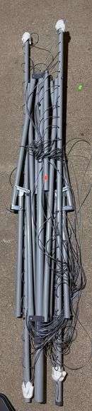 Retractable Clothes Line with Gray Metal Poles and Wire Lines - Metzger ...