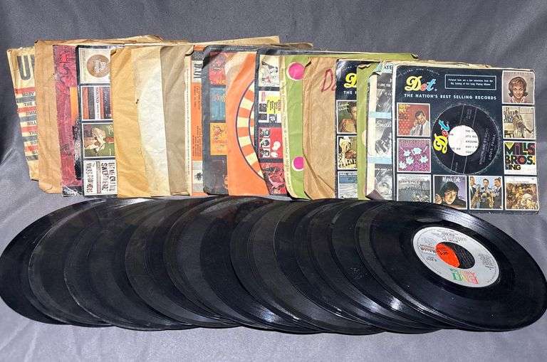 17 45 RPM Vinyl Records with Original Sleeves - Metzger Property ...