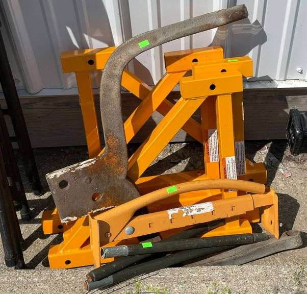 Yellow Metal Jack Stands and Rusted Metal Parts - Metzger Property ...