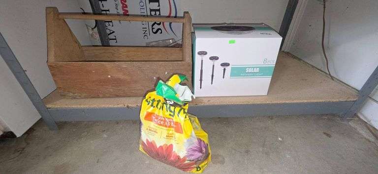Wood Tote, Partial Bag of Potting Mix, and Box of Solar Pathway Lights ...
