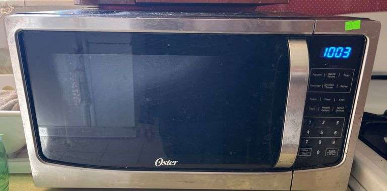 Oster 1100-Watt Countertop Microwave Oven with Digital Display ...