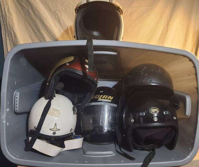 Six Motorcycle Helmets in a Storage Bin - Metzger Property Services, LLC