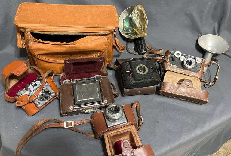 Film Cameras with Accessories and Leather Cases - Metzger Property ...