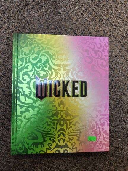 ‘Wicked’ Hardcover Book with Vibrant Cover Art - Metzger Property ...