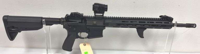 Springfield armory models 5.56 MM rifle with flip up sites and red dot ...
