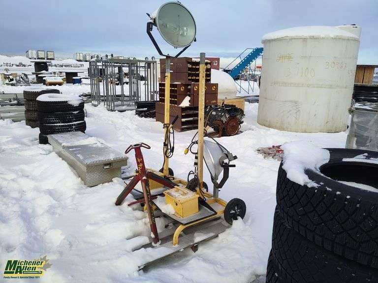 Pallet with 2 Light Tower Stands - Michener Allen Auctioneering Ltd