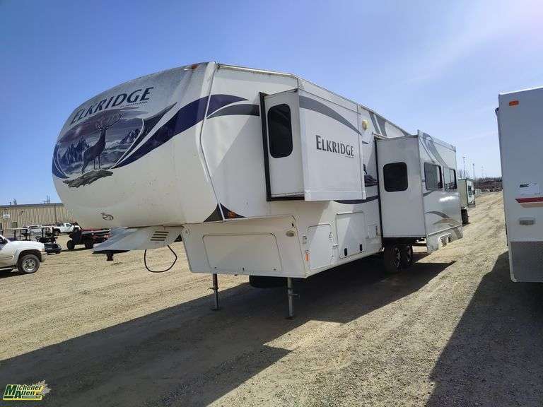 2011 Heartland Elkridge 29RKSA T/A 5W - Michener Allen Auctioneering Ltd