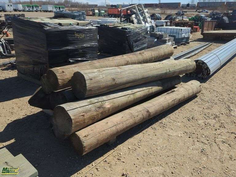 Pressure Treated Wooden Posts - Michener Allen Auctioneering Ltd