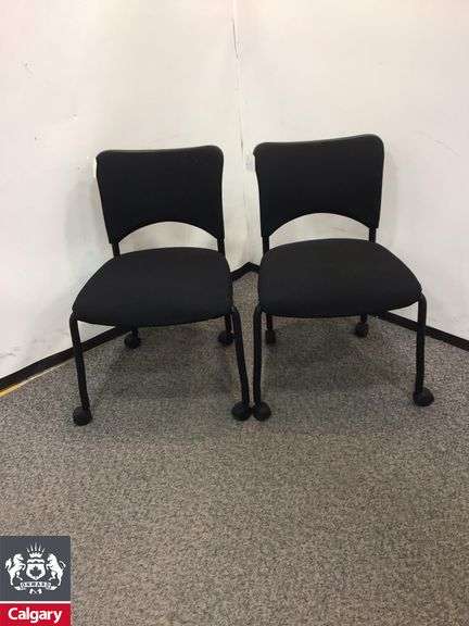 Set of 2 Teknion Amicus 4 post chairs no arms with wheels - Black ...