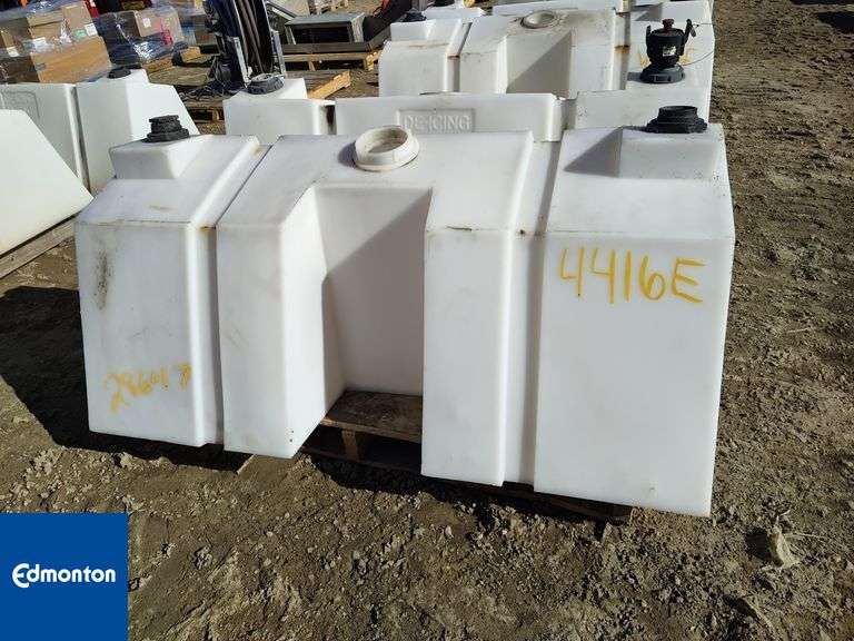 Pallet with 2 Used Calcium Plastic Tanks - Michener Allen Auctioneering Ltd