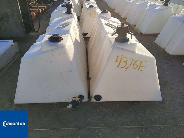 Pallet with 2 Used Calcium Plastic Tanks - Michener Allen Auctioneering Ltd