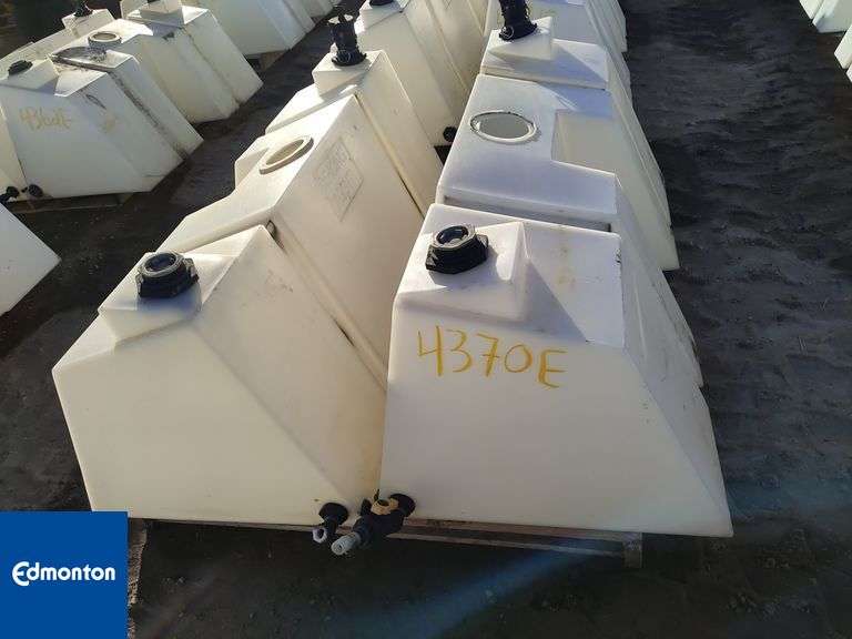 Pallet with 2 Used Calcium Plastic Tanks - Michener Allen Auctioneering Ltd