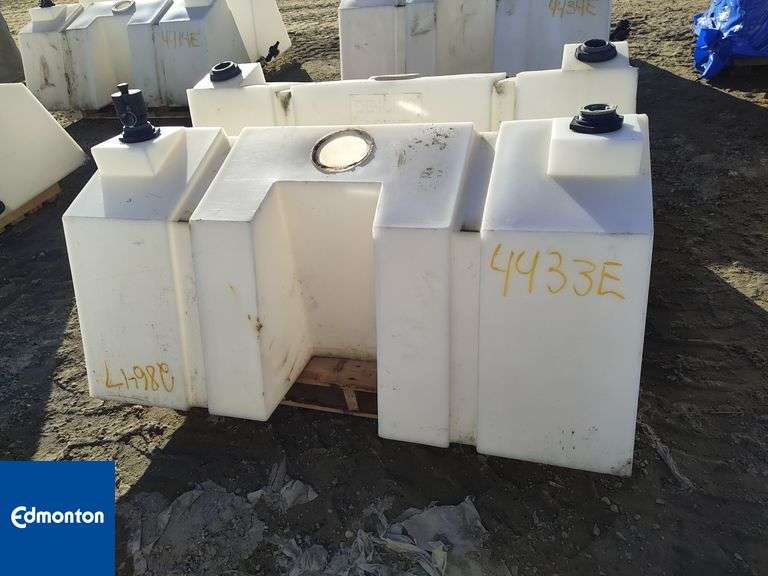 Pallet with 2 Used Calcium Plastic Tanks - Michener Allen Auctioneering Ltd