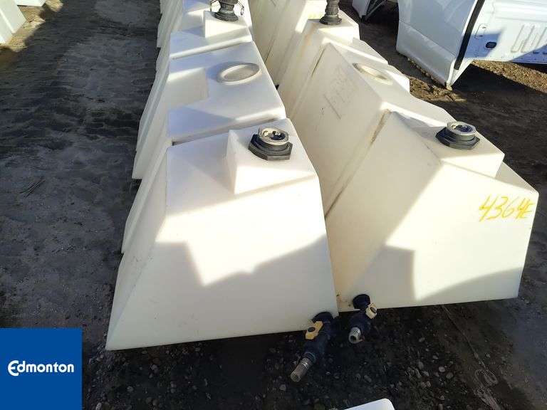 Pallet with 2 Used Calcium Plastic Tanks - Michener Allen Auctioneering Ltd