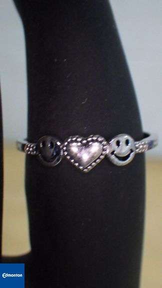 Ring (size 7.5) - Michener Allen Auctioneering Ltd