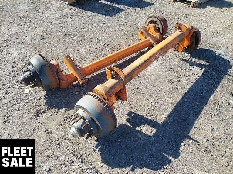 2 Axles Complete With Hubs and Drums - Michener Allen Auctioneering Ltd