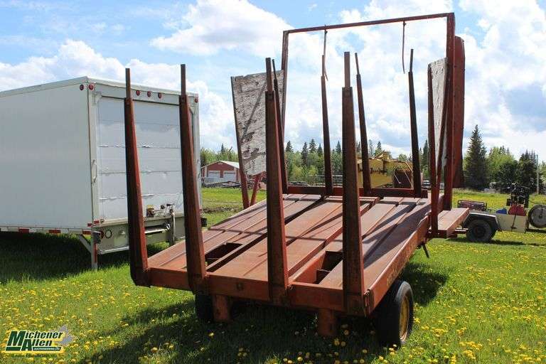 NEW HOLLAND Model 1030 Bale Wagon - Michener Allen Auctioneering Ltd