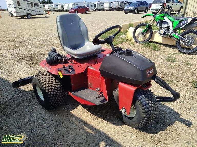Toro Sand Pro 5020 Ride-On Sweeper - Michener Allen Auctioneering Ltd