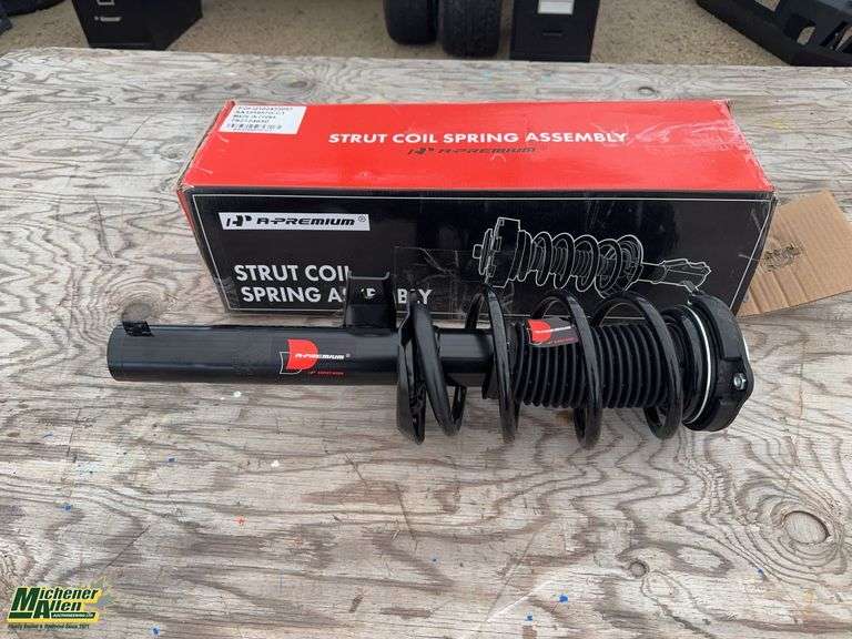 Strut Coil Spring Assembly - Michener Allen Auctioneering Ltd