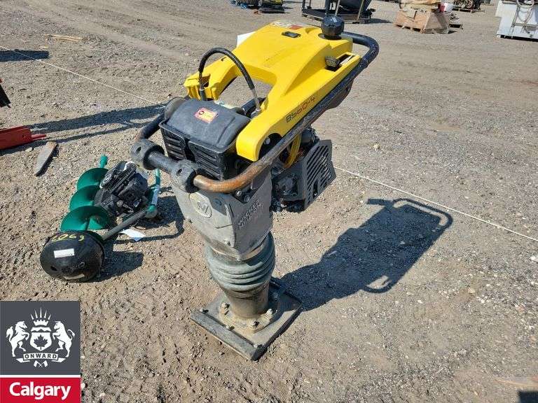 Yellow Wacker Tamper - Michener Allen Auctioneering Ltd