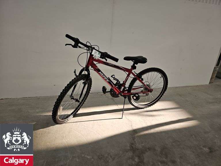 Red Huffy Granite - Michener Allen Auctioneering Ltd