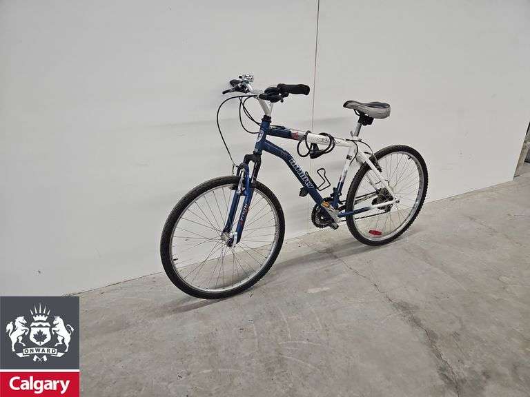 White Infinity Mercury - Michener Allen Auctioneering Ltd