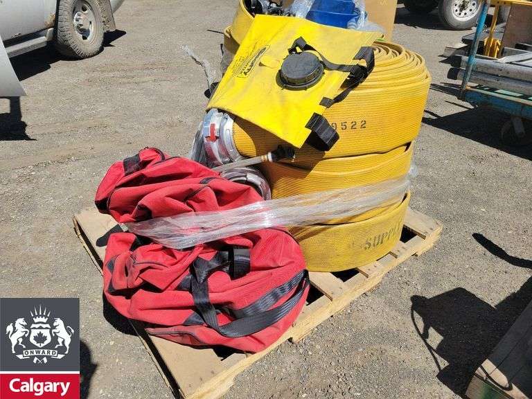 Pallet of 3 fire hoses, 4 led smoke alarm ,3 red duffel bags and scotty ...