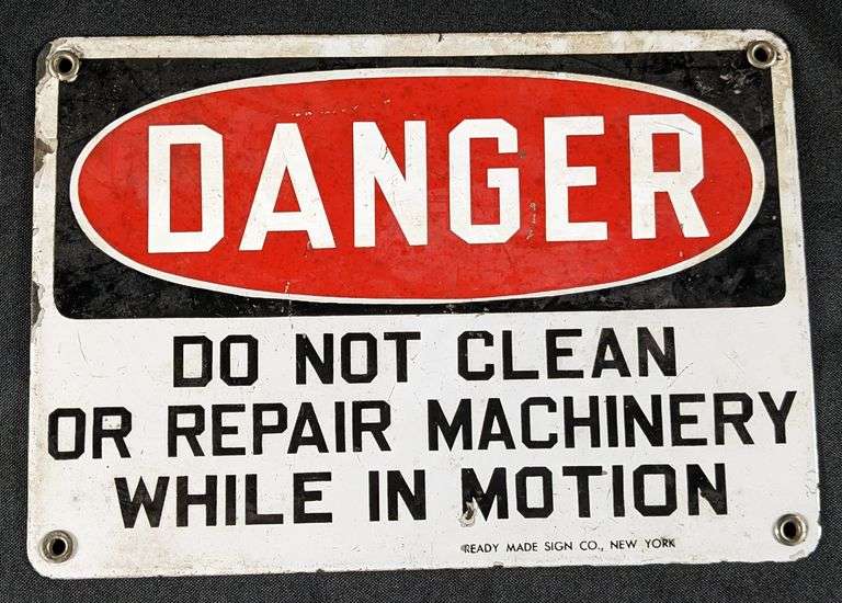 PORCELAIN DANGER SIGN DO NOT CLEAN WHILE IN MOTION - Millers Auction Co.