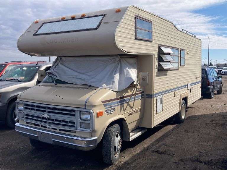1985 Coachman Camper - McLaughlin Auctioneers, LLC- mc-bid.com