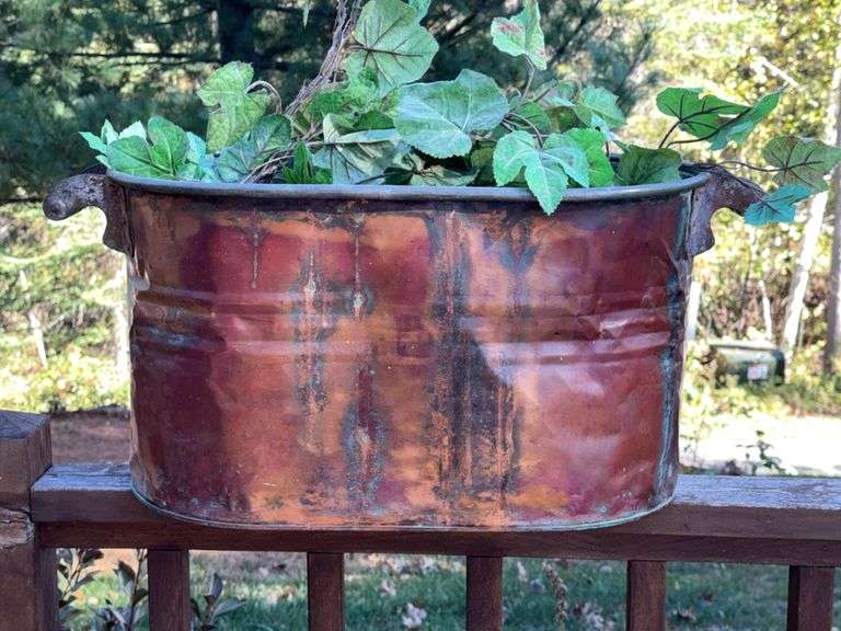 Copper boiler with silk plants - McLaughlin Auctioneers, LLC- mc-bid.com