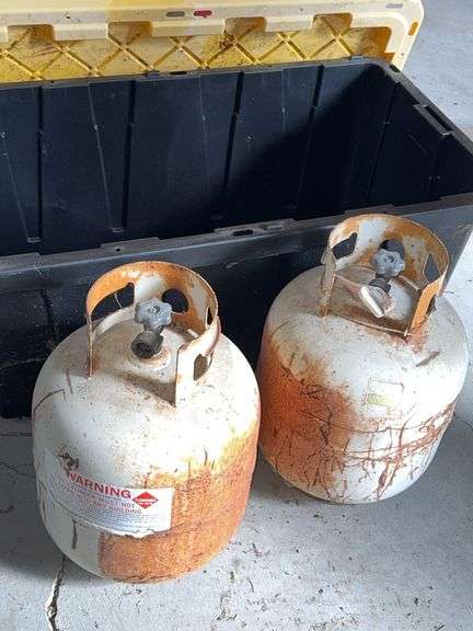 Large tote with two propane tanks - McLaughlin Auctioneers, LLC- mc-bid.com
