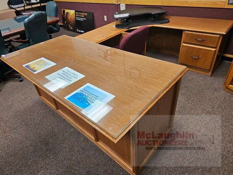 U-Shaped Oak Office Desk with Glass Top and Maroon Rolling Chair ...