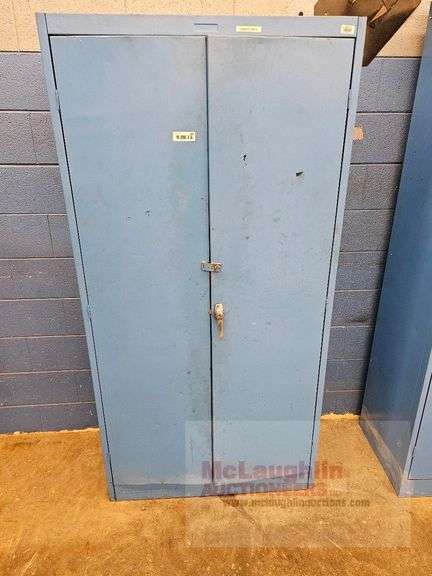 Blue Metal Storage Cabinet - McLaughlin Auctioneers, LLC- mc-bid.com
