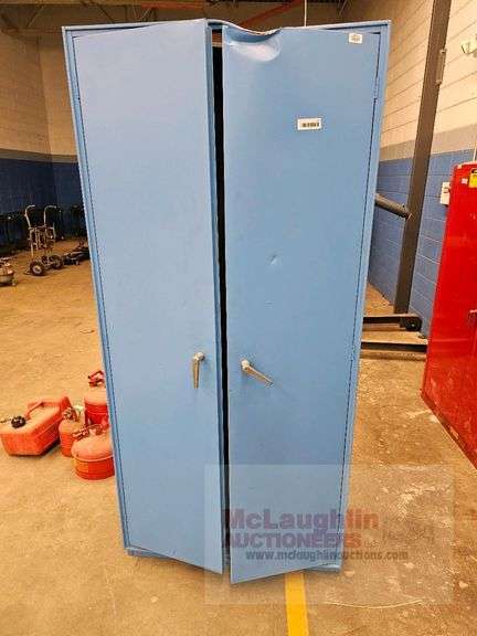Blue Metal Storage Cabinet - McLaughlin Auctioneers, LLC- mc-bid.com