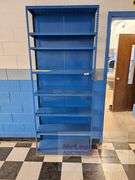 Blue Metal Shelving Unit - McLaughlin Auctioneers, LLC- mc-bid.com