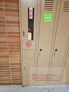 8 Beige Metal School Lockers with Combination Locks. Fire Extinguisher ...