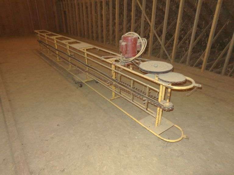 Approximate 16 foot hay elevator with electric motor in loft of ...