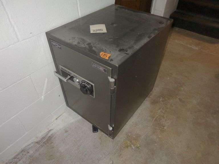 Safe guard safe with combination. located in basement. bring help ...